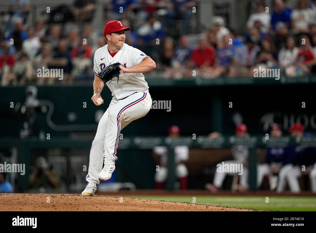 Texas Rangers relief pitcher Josh Sborz winds up to deliver to the St ...