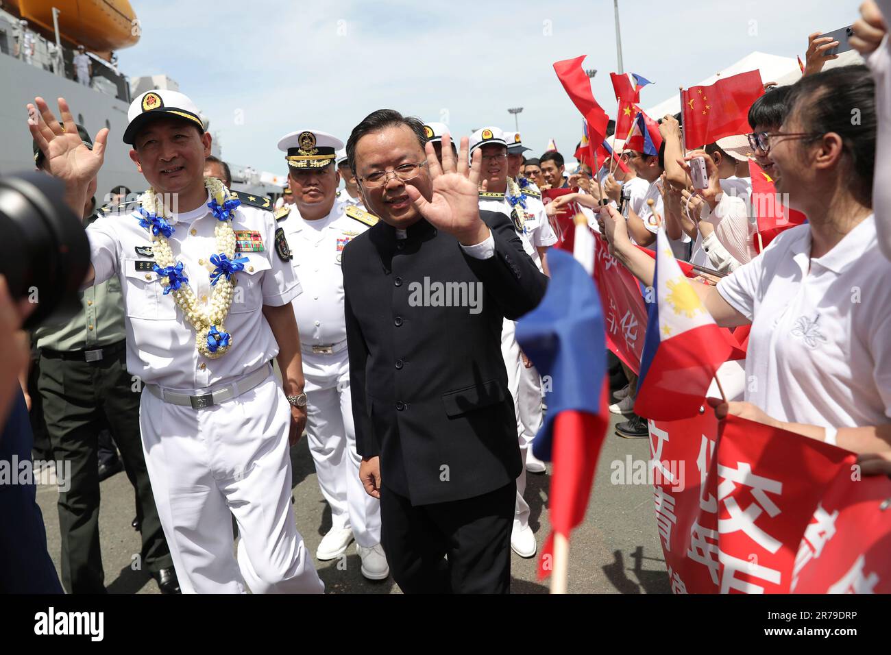 Chinese Ambassador to the Philippines Huang Xilian, center, and Chinese ...