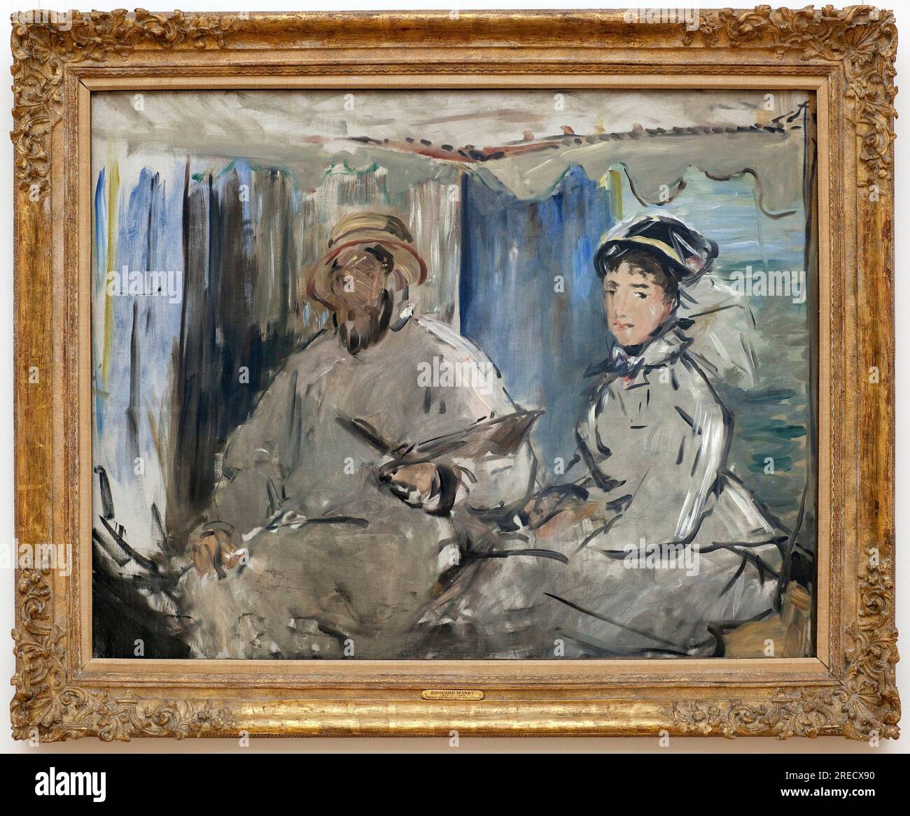 Le peintre Claude Monet (1840-1926) dans son atelier. (A ses cotes, son ...