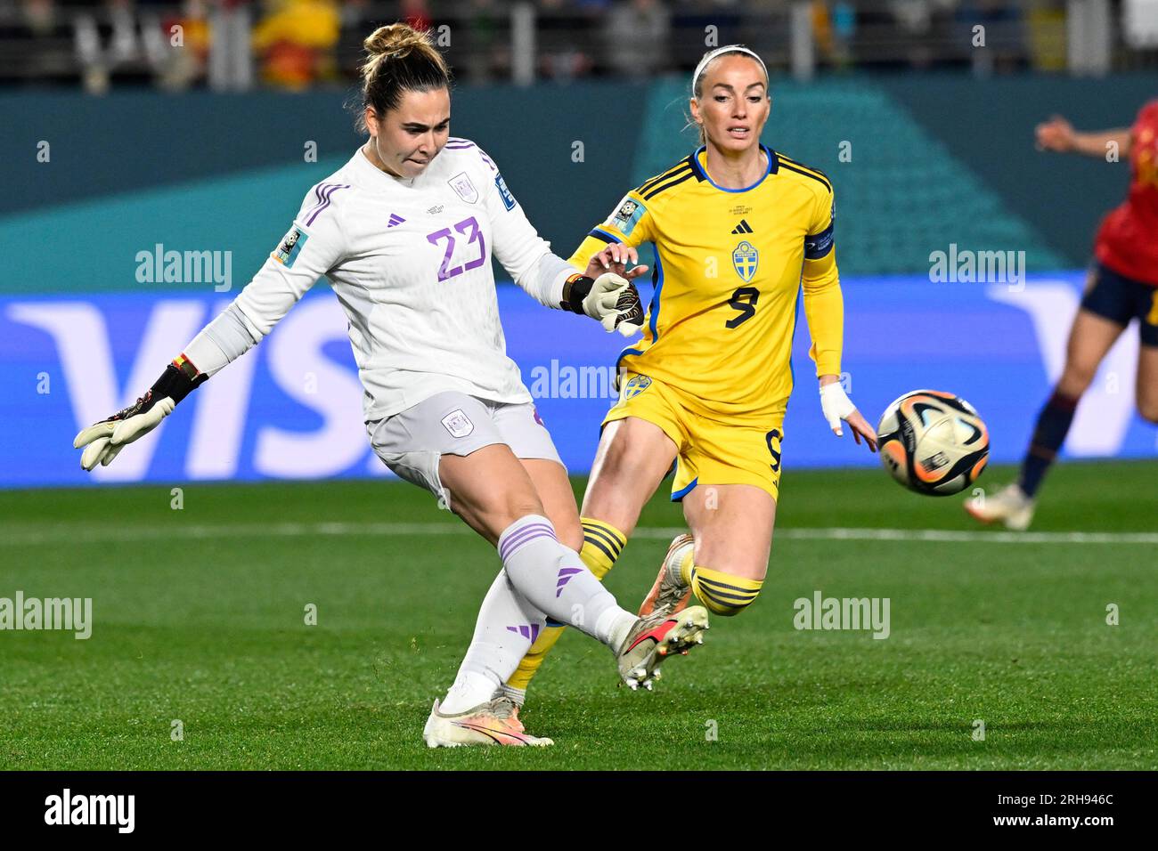 Spain's goalkeeper Cata Coll, left, kicks the ball as Sweden's Kosovare ...