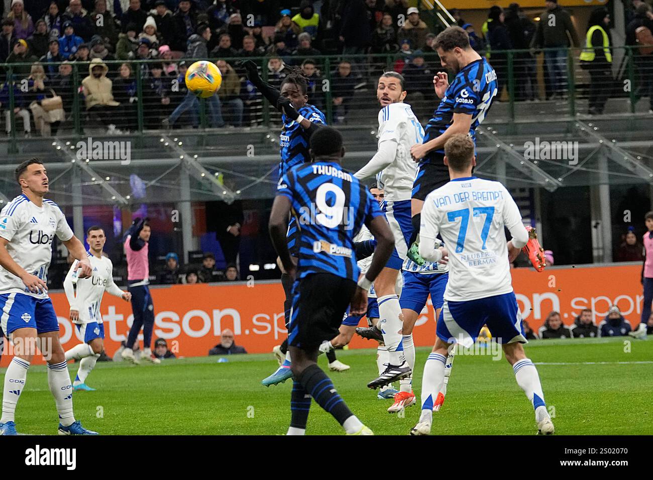 Inter Milan's Carlos Augusto, center right, scores against Como during ...