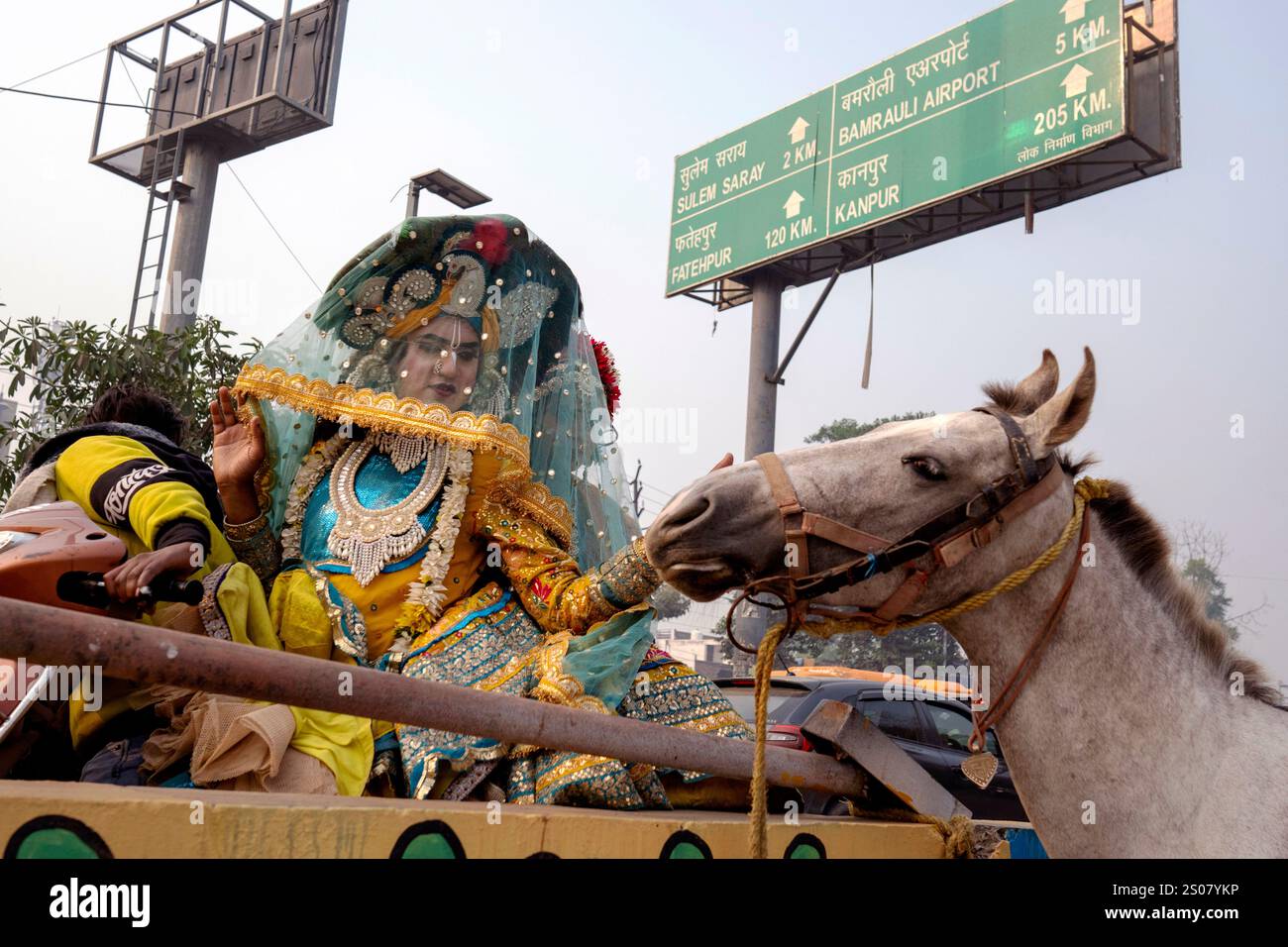 An Indian artist performs during a procession of Shree Panchagni Akhada ...