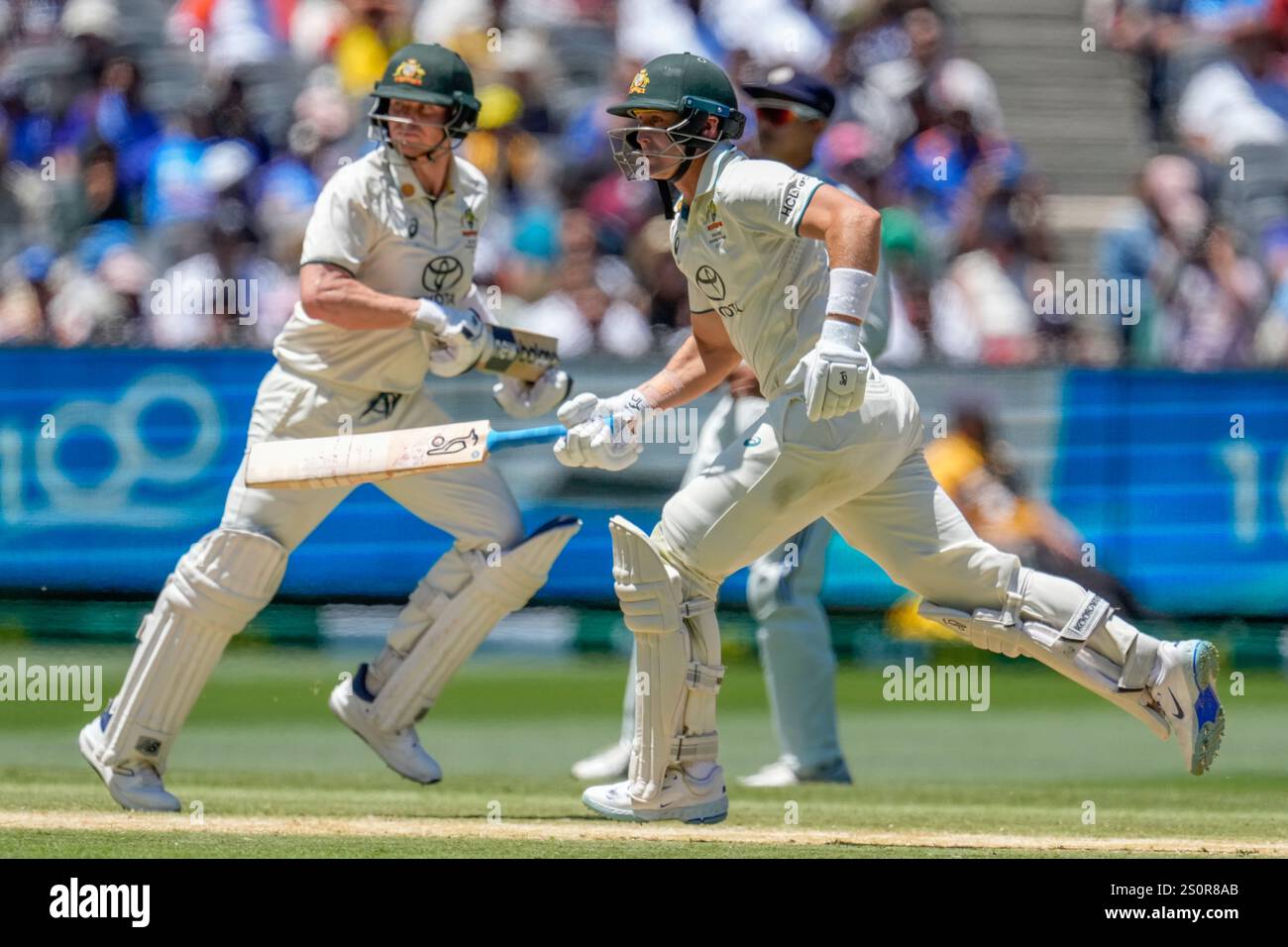 Australia's Marnus Labuschagne, right, and Steve Smith run between the ...