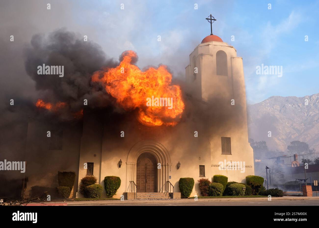 FILE - The Altadena Community Church explodes in flames during the ...