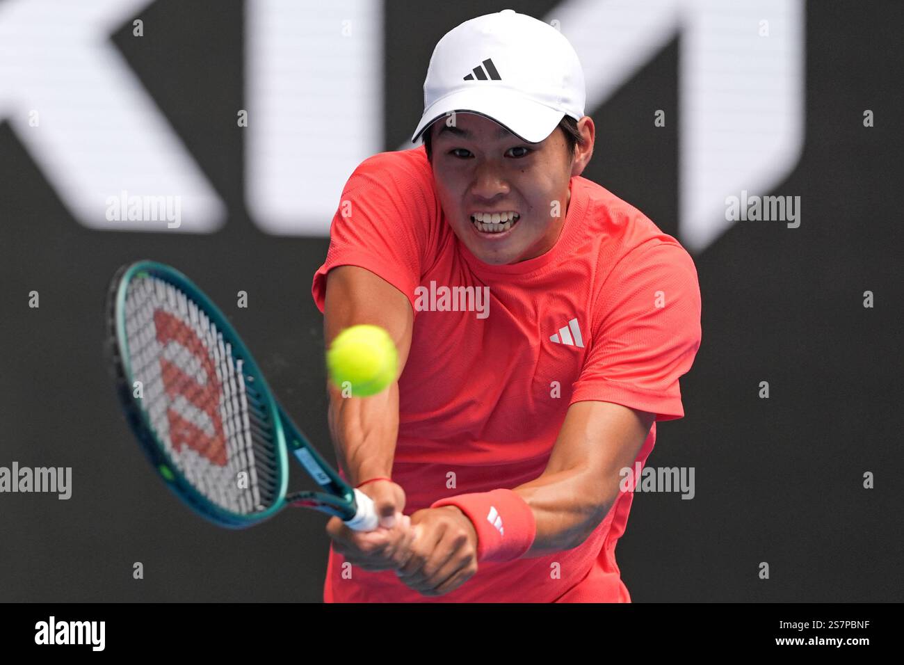 Learner Tien of the U.S. plays a backhand return to Lorenzo Sonego of Italy during their fourth ...