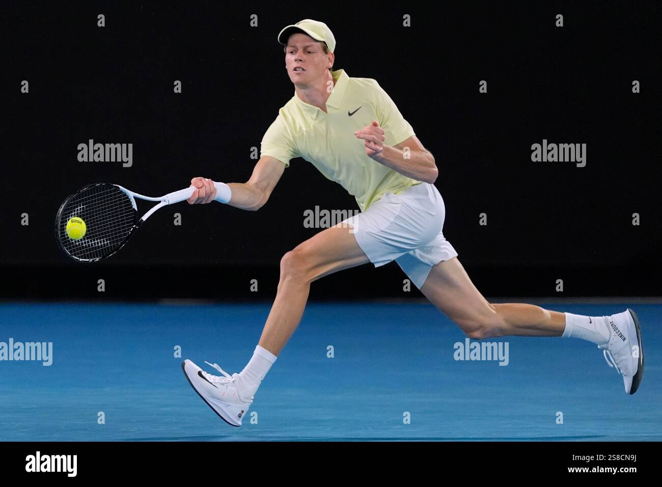 Jannik Sinner of Italy plays a forehand return to Alex de Minaur of Australia during their ...