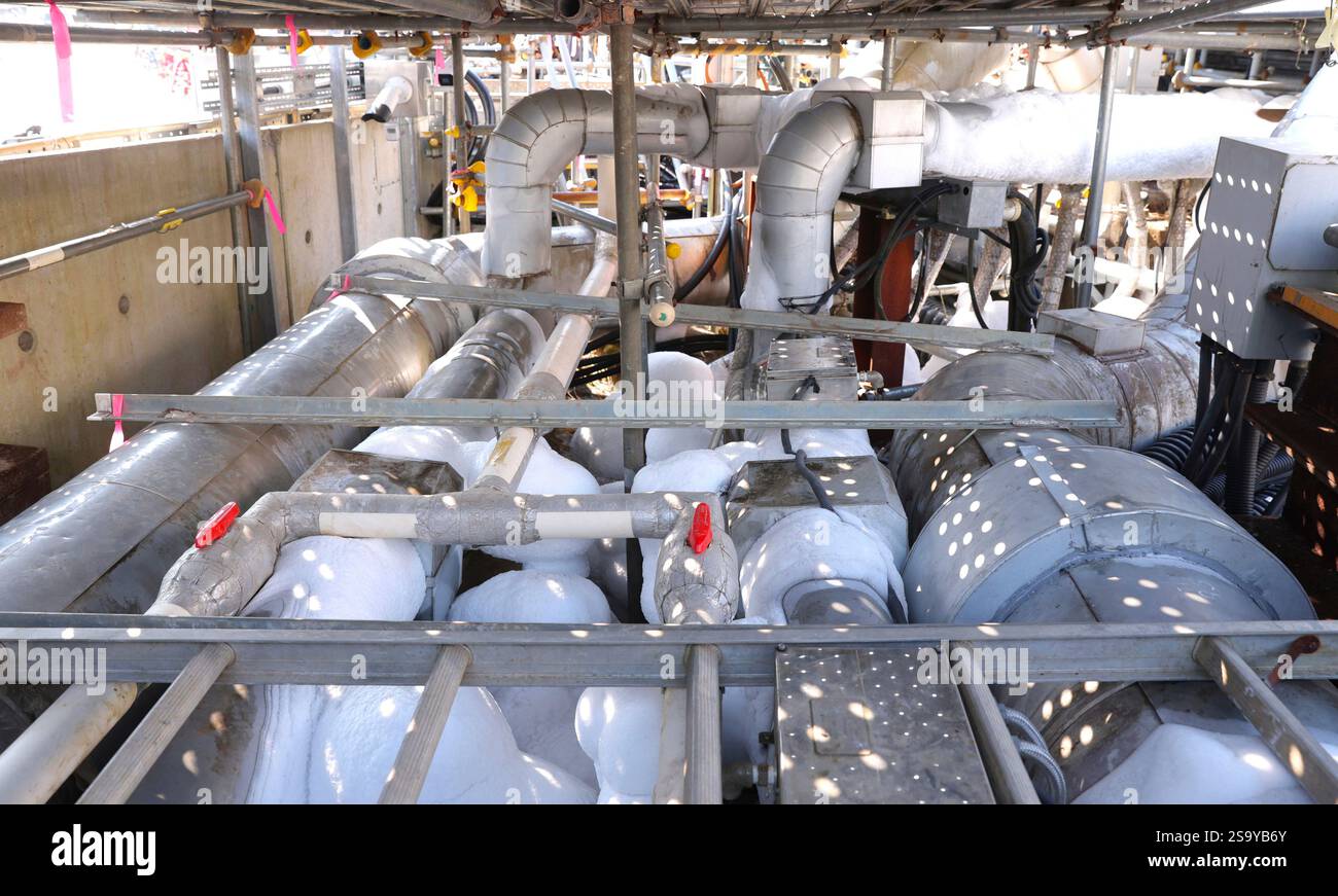 A photo shows frozen soil walls to prevent groundwater from flowing in ...