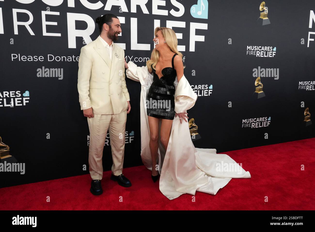 Noah Kahan,left, and Kelsea Ballerini arrive at the 67th annual Grammy ...