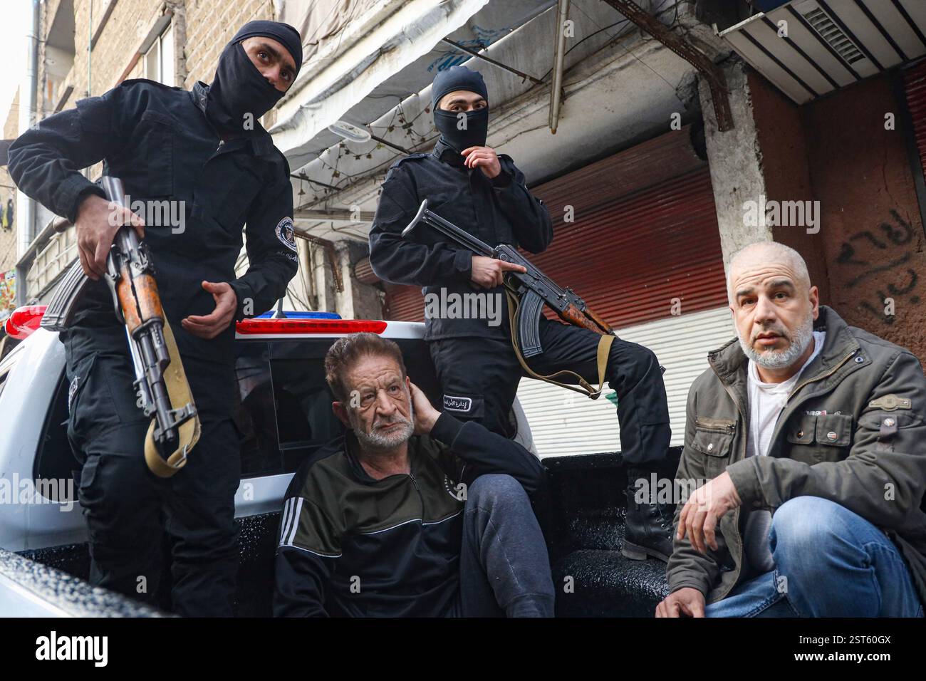 Imad Mohammed Al-Mahmoud, center left, and Somer Mohammed Al-Mahmoud ...