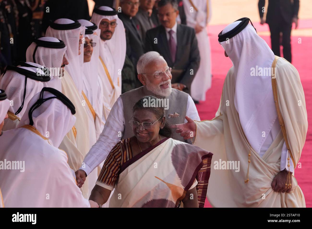 Indian President Droupadi Murmu, front and Indian Prime Minister Narendra Modi, behind meet ...
