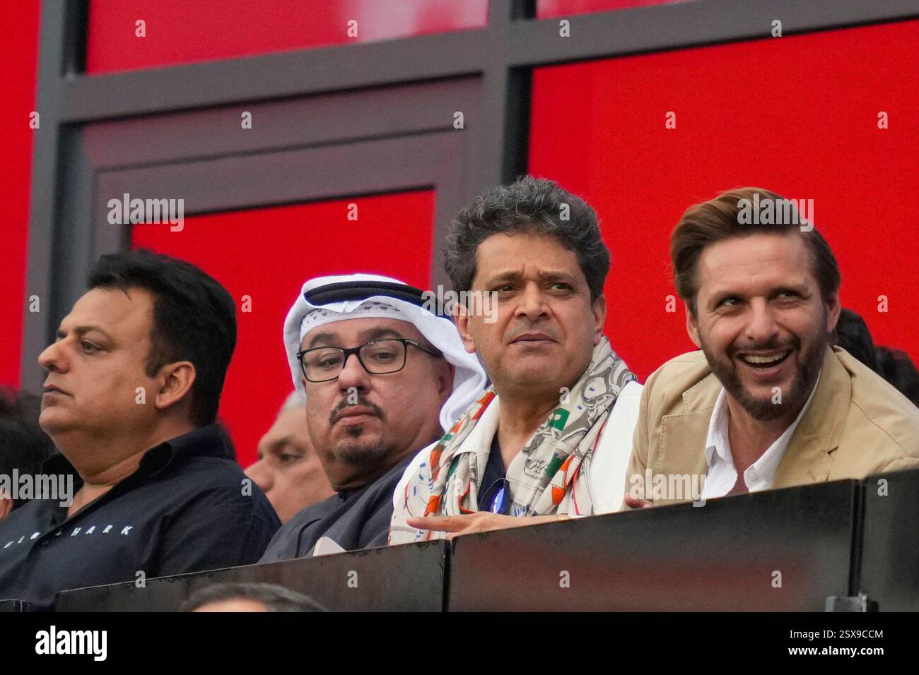 Former Pakistani cricketer Shahid Afridi , right, watches the ICC ...