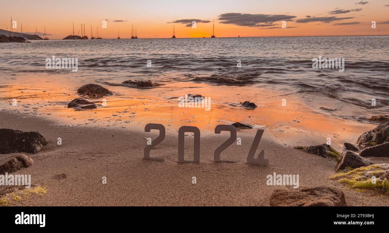 Felice anno nuovo 2024: Concetto di anno nuovo 2024 con un tramonto ...