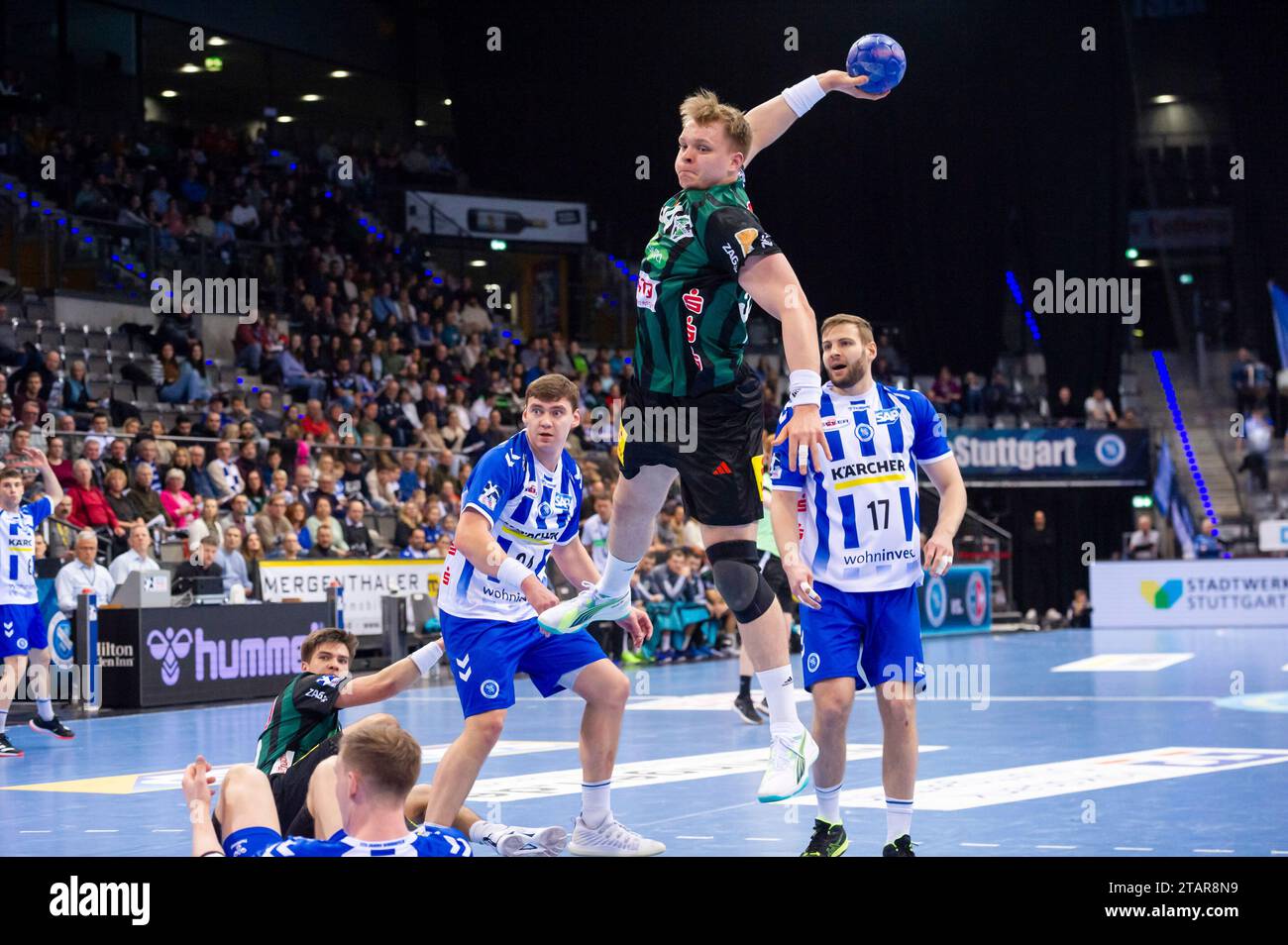 Stoccarda, Deutschland. 2 dicembre 2023. Justus Fischer (TSV Hannover-Burgdorf, #54), li: Lukas ...