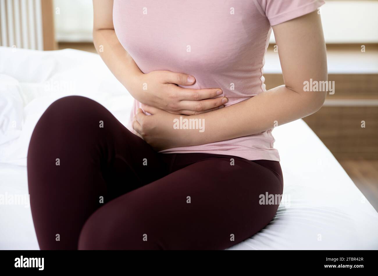 Tocco di mal di stomaco immagini e fotografie stock ad alta risoluzione ...