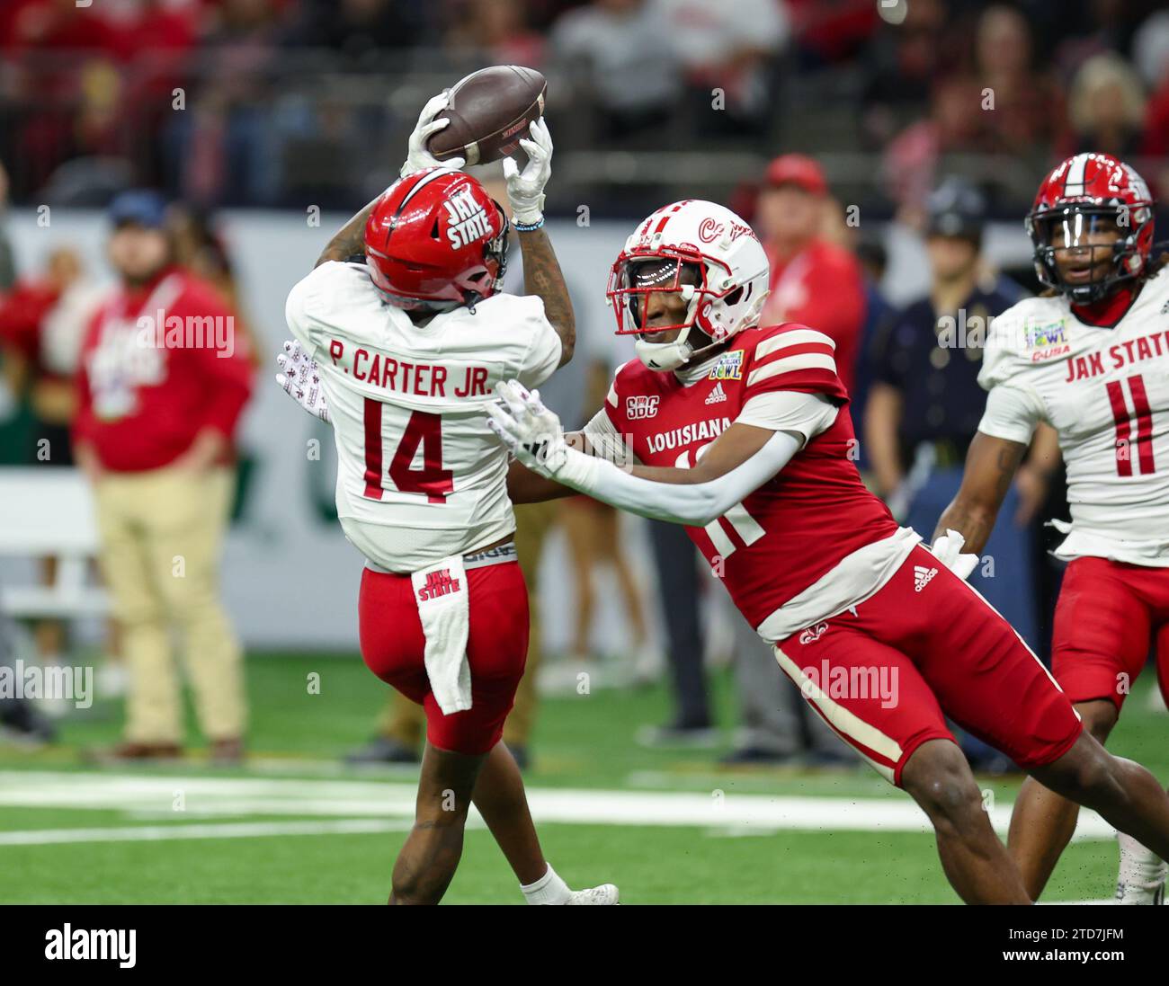 16 dicembre 2023: Perry carter di Jax State (14) riceve un passaggio ...