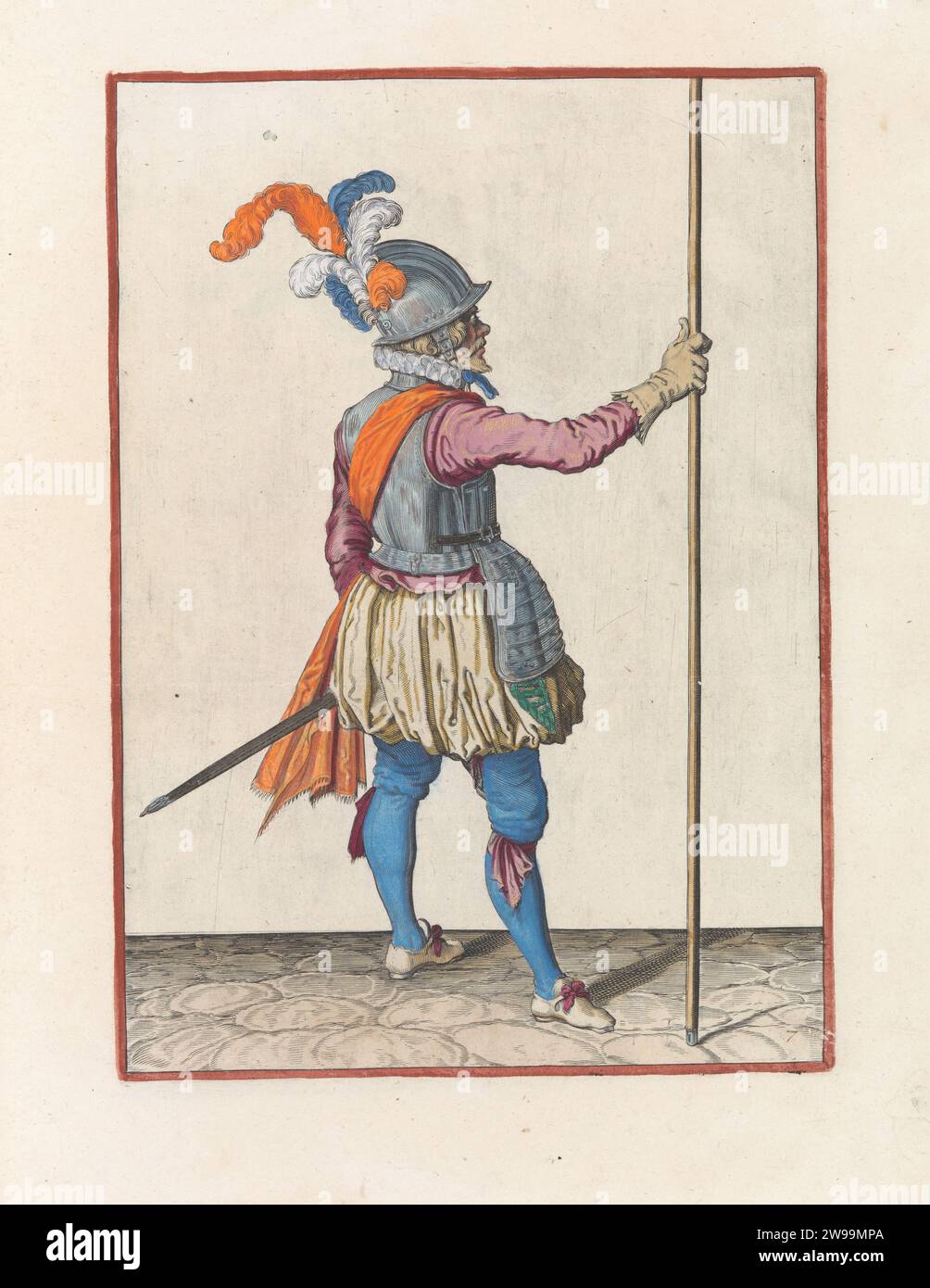 Soldato, visto sulla schiena, tenendo i suoi spiedini in posizione ...