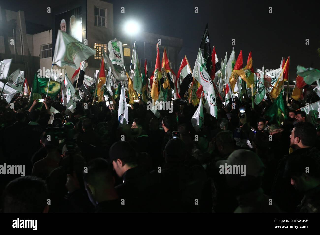 Baghdad, Iraq. 4 gennaio 2024. I membri delle forze di mobilitazione ...