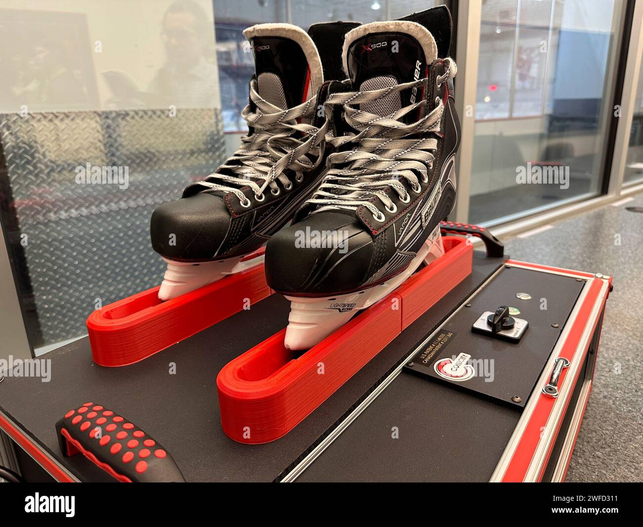 Skates sit in a Conicity Technologies’ grinding machine designed to ...