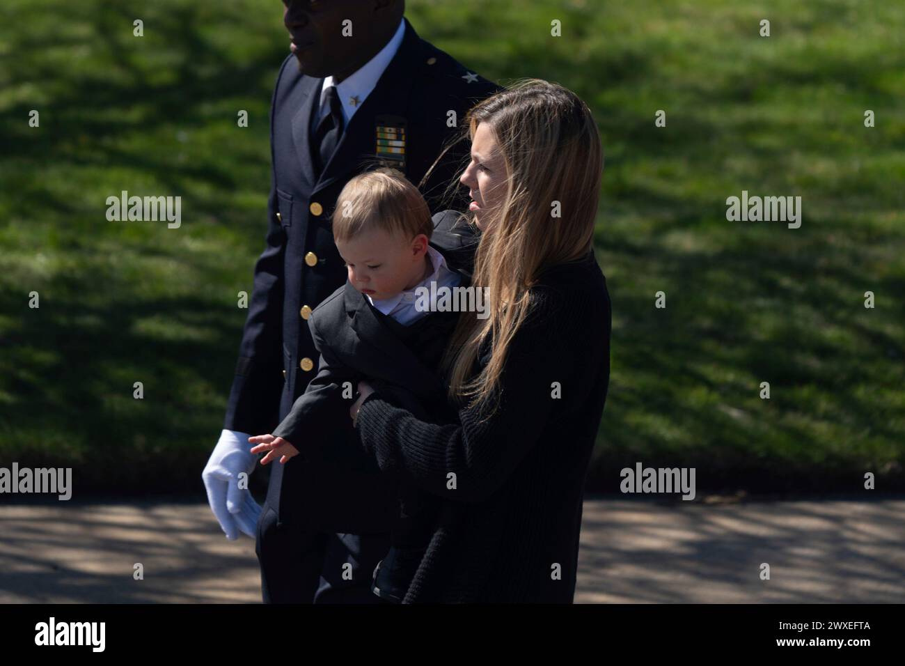 Jonathan Diller 's wife Stephanie Diller and her son arrive during a ...