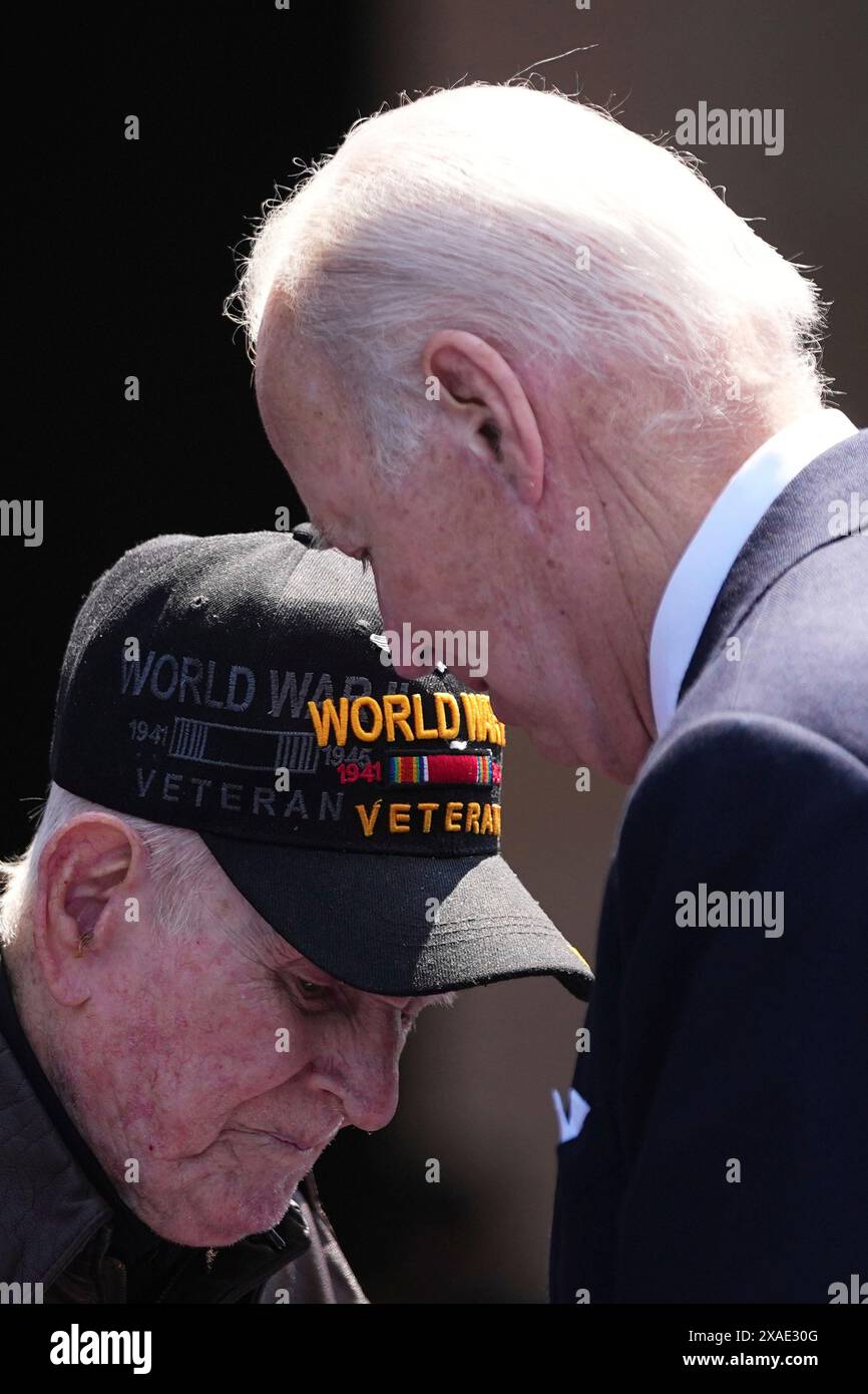 President Joe Biden reacts with US WW II veteran Bob Pedigo after he ...