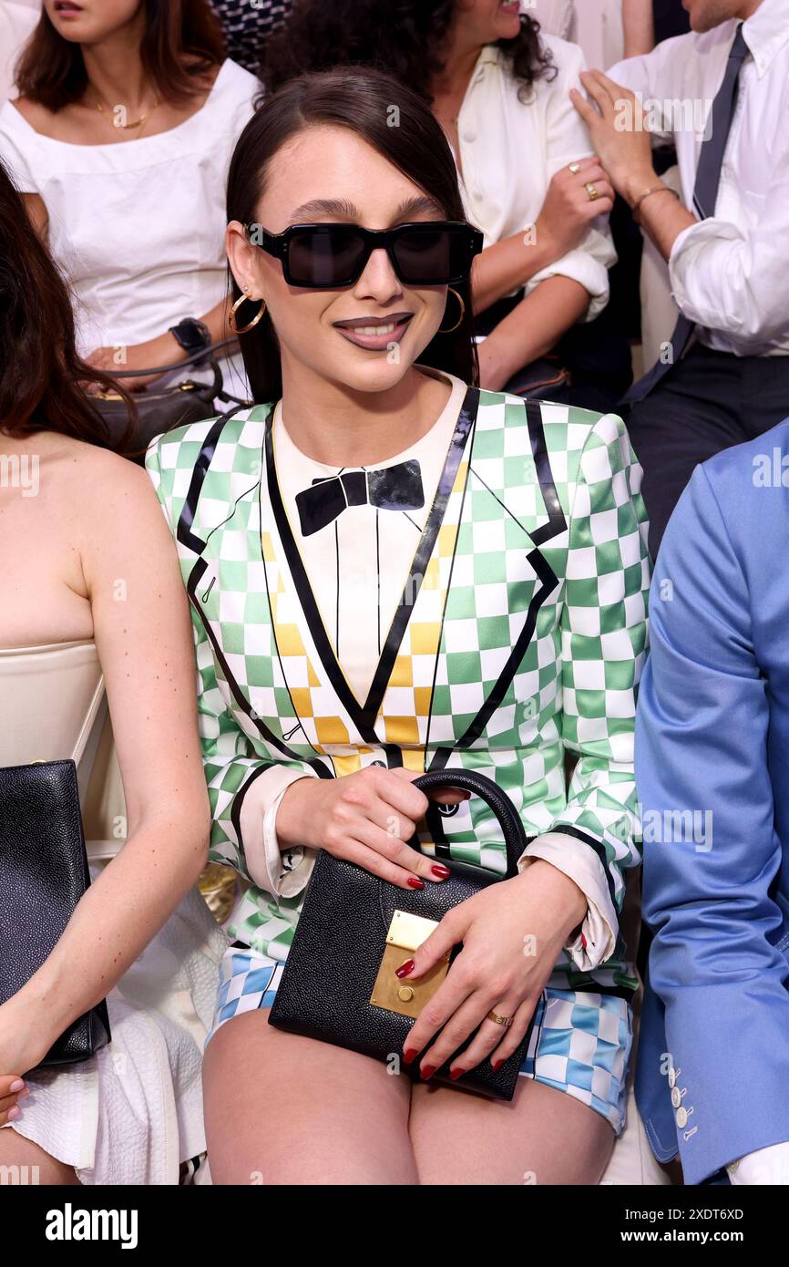 Emma Chamberlain poses for photographers at the Thom Browne Haute ...