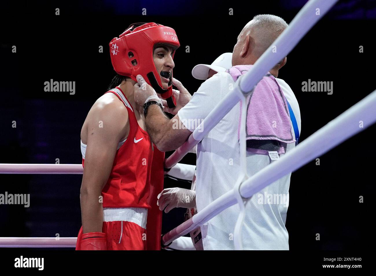 Algeria's Imane Khelif stands in her corner after fighting Italy's ...
