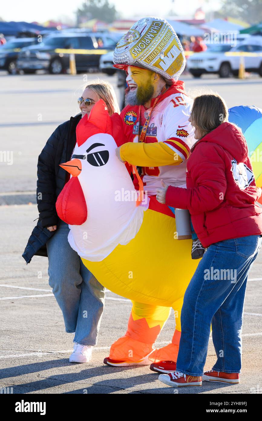 Taylor Garrison of Springfield, Mo. poses for a photo with other fans ...