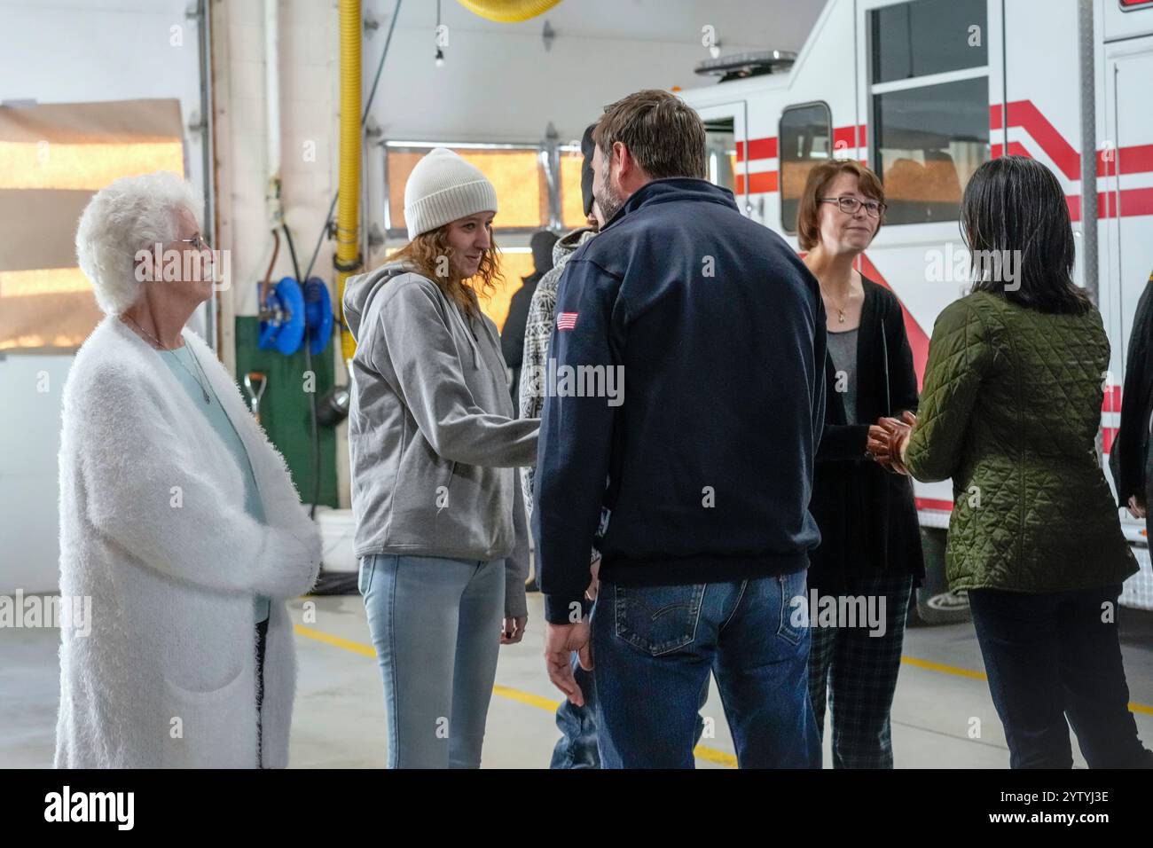 At the Fairview Volunteer Fire Department with his wife, Usha, far ...