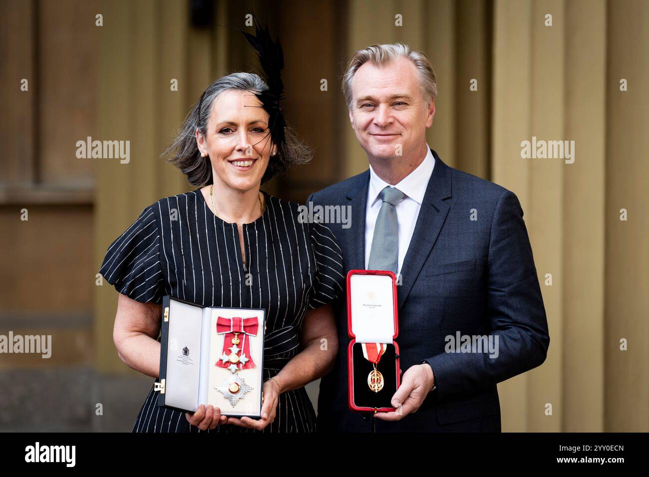 Emma Nolan and Christopher Nolan, pose after being made a Dame ...