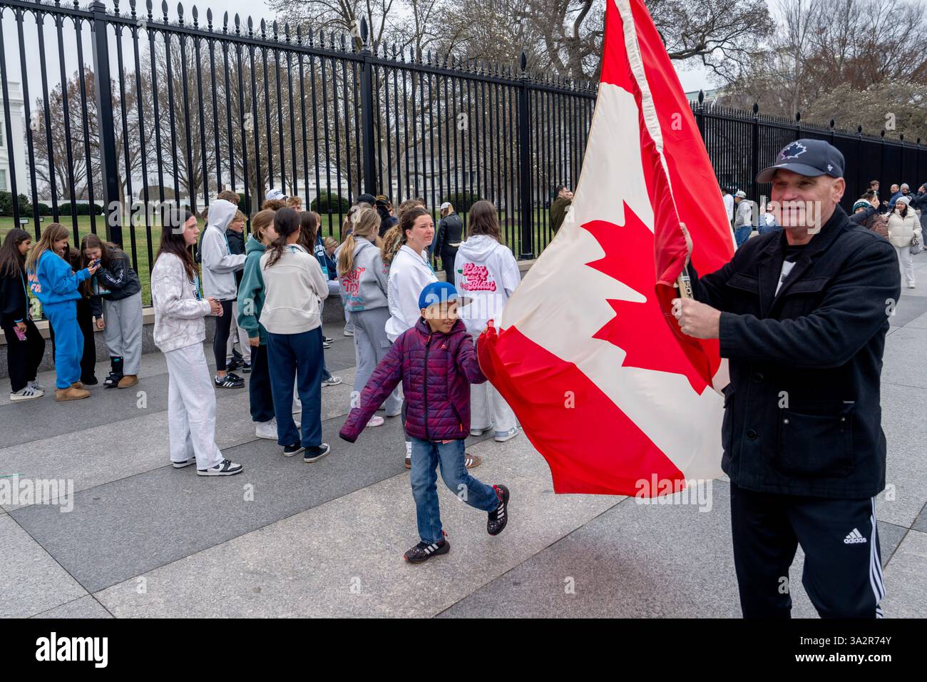 Toronto residents Douglas Bloomfield, from right, and his son Phoenix ...