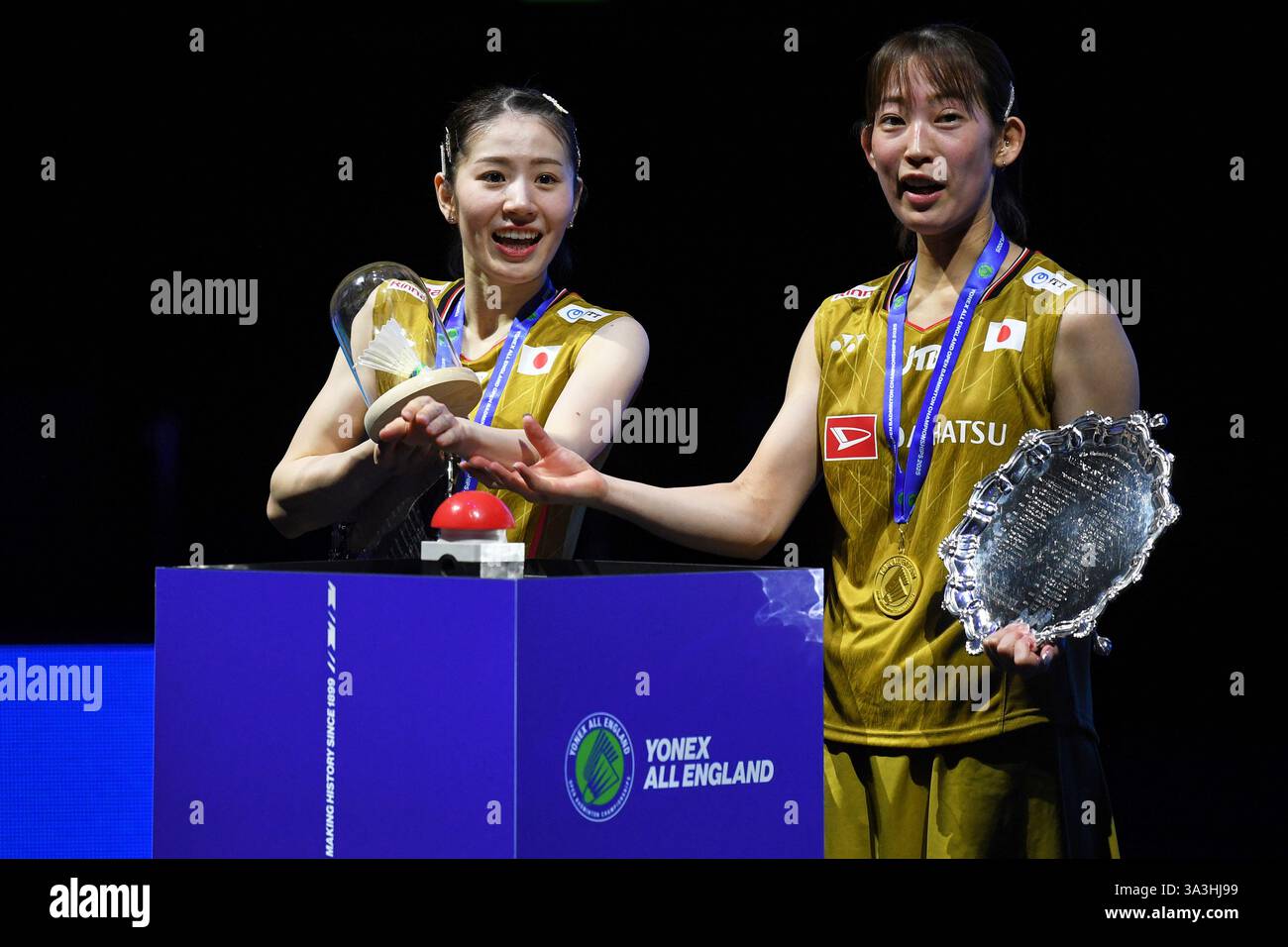 Japan's Chiharu Shida, left, and her partner Nami Matsuyama celebrate after defeating Japan's ...
