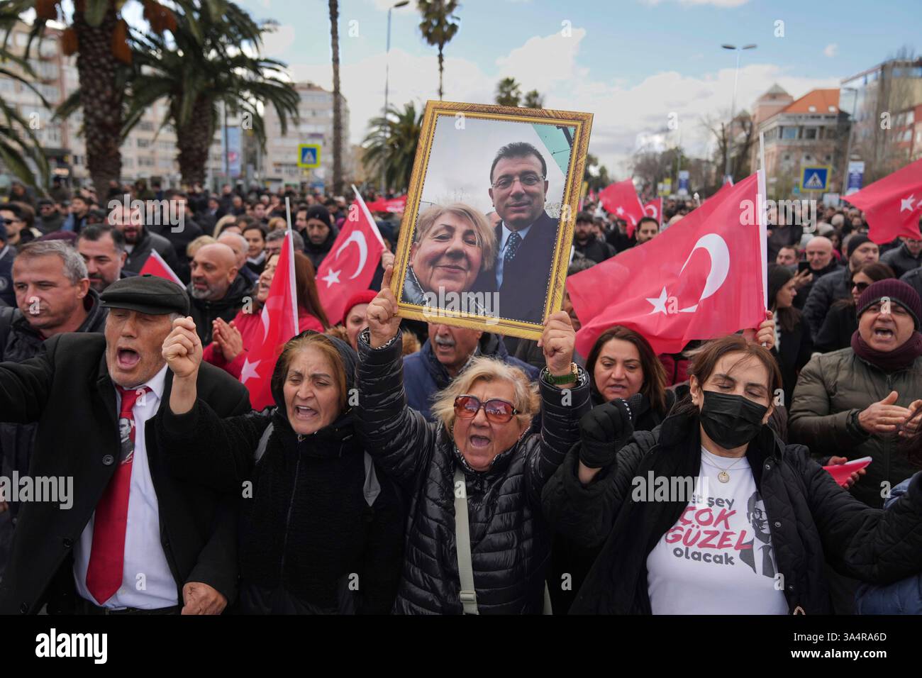 People chant slogans as they protest the arrest of Istanbul Mayor Ekrem ...