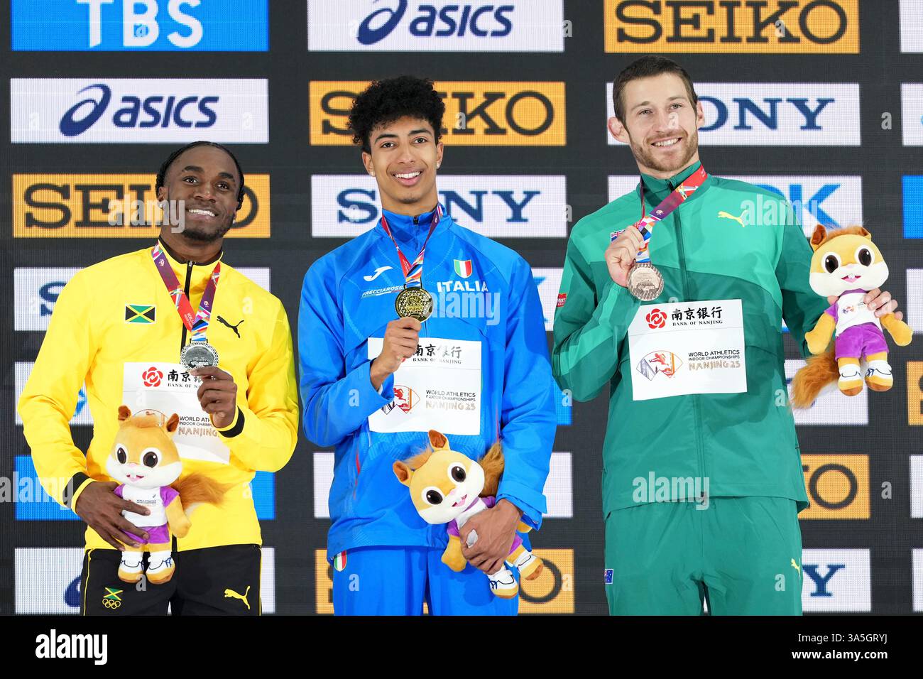 Silver medalist Wayne Pinnock, of Jamaica, gold medalist Mattia Furlani ...