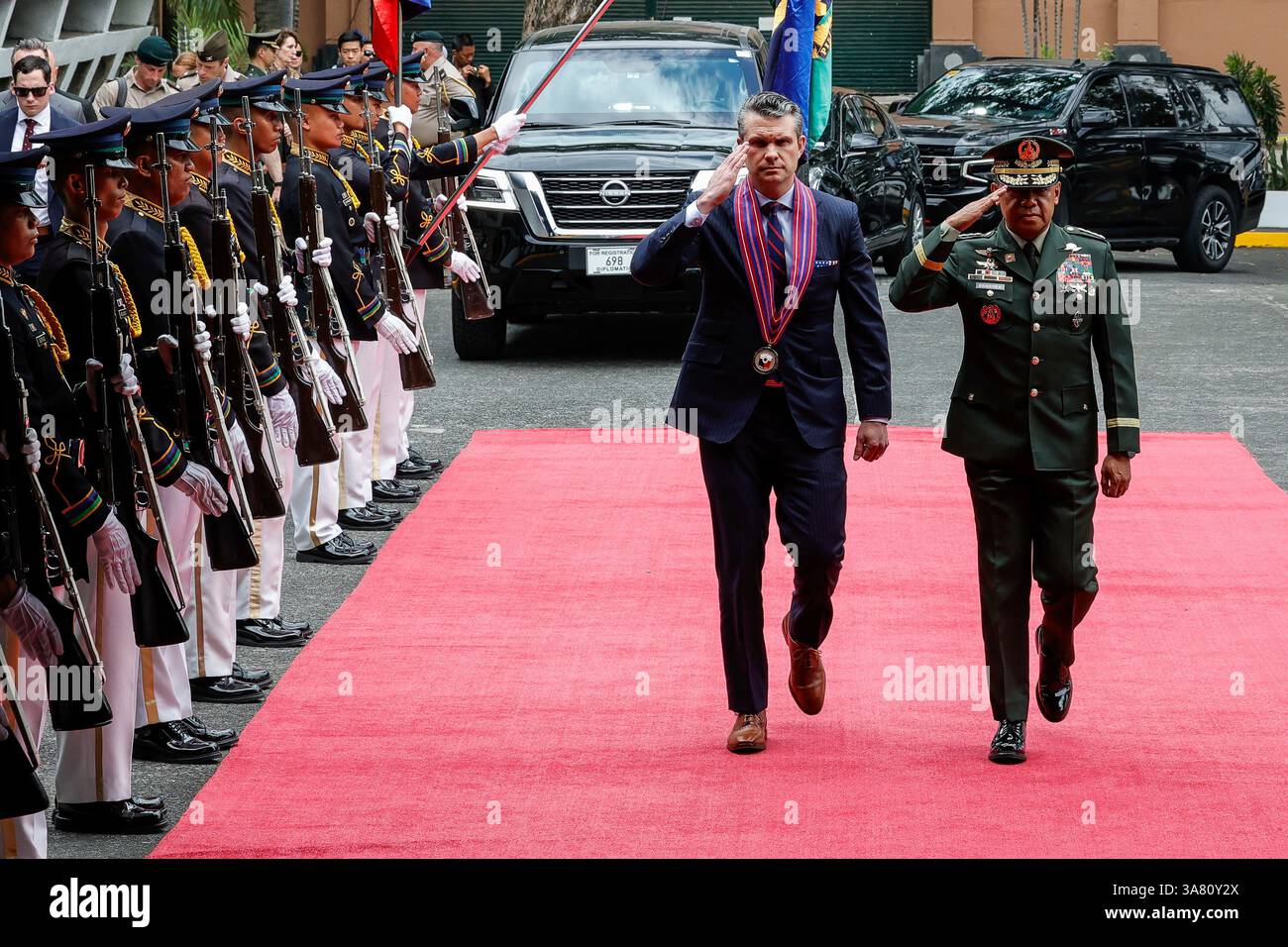 U.S. Defense Secretary Pete Hegseth, center, along with Armed Forces of the Philippines Chief of ...