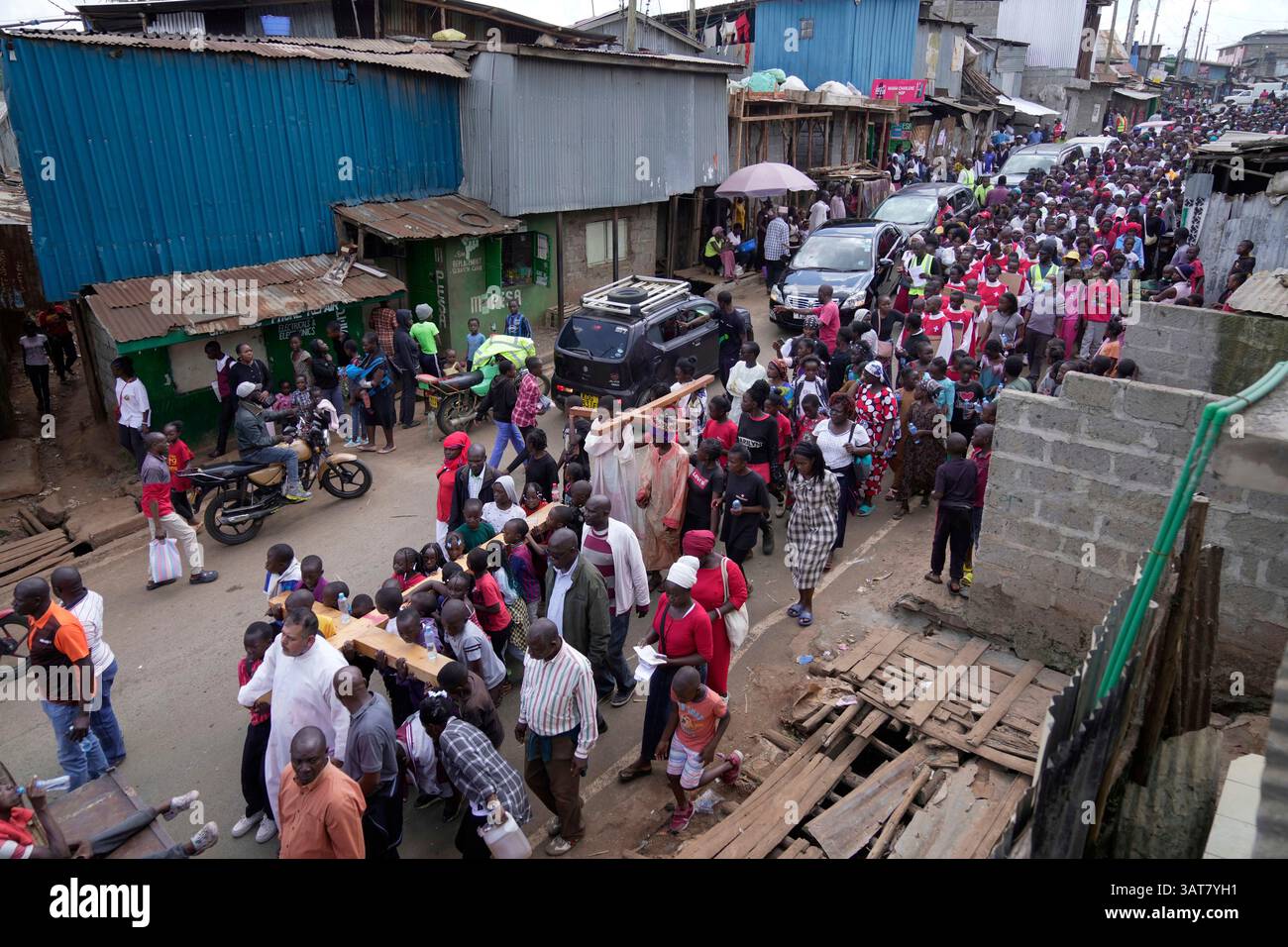 Christians take part in a Way of the Cross reenactment of Jesus ...