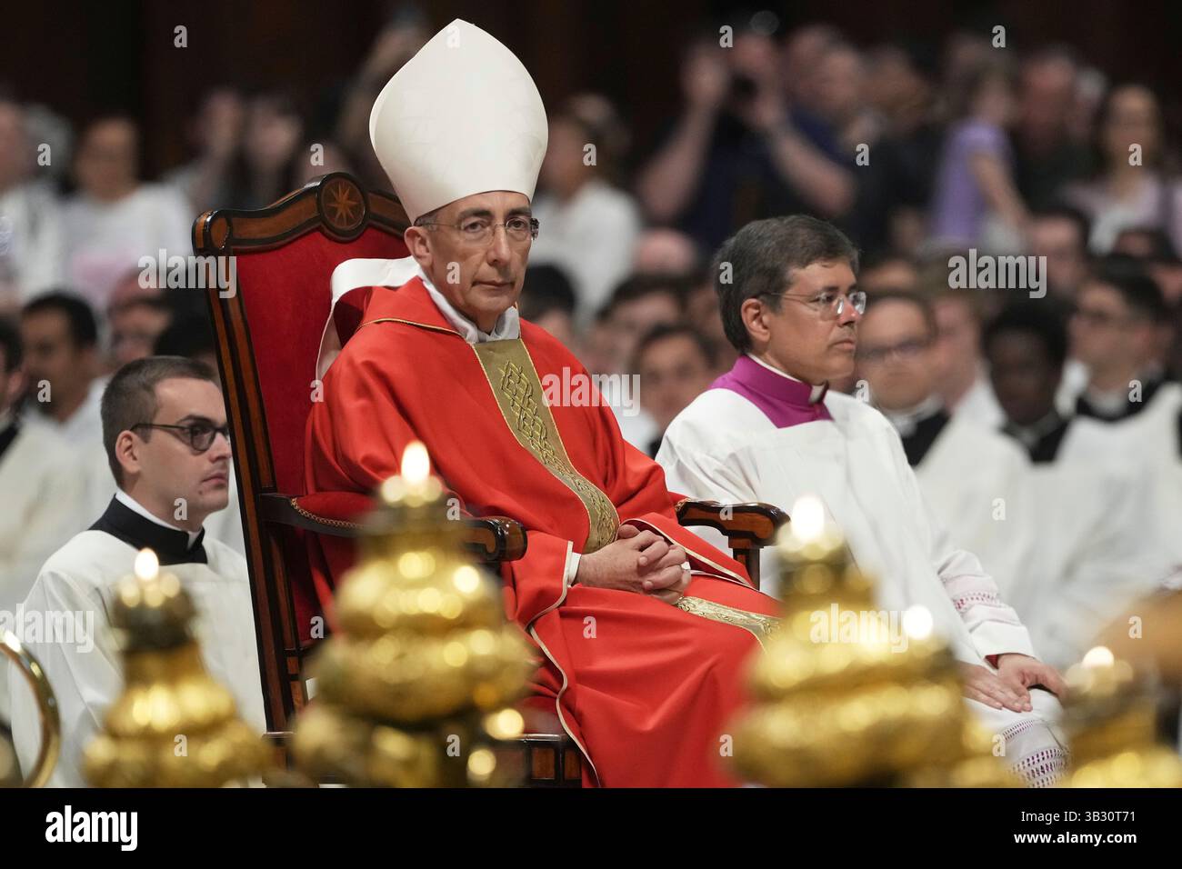 Cardinal Baldassare Reina celebrates a mass on the third of nine days ...