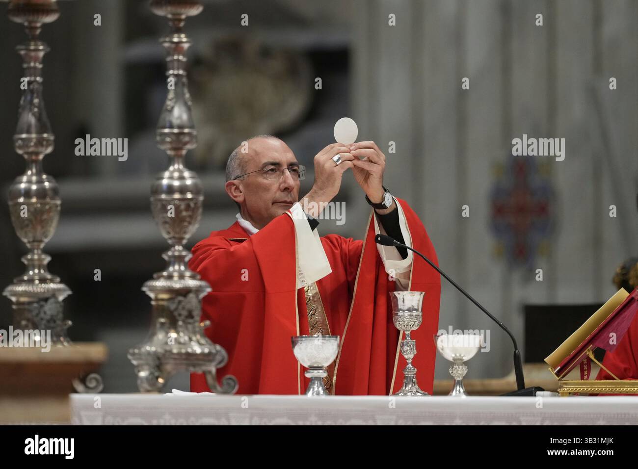 Cardinal Baldassare Reina celebrates a mass on the third of nine days ...