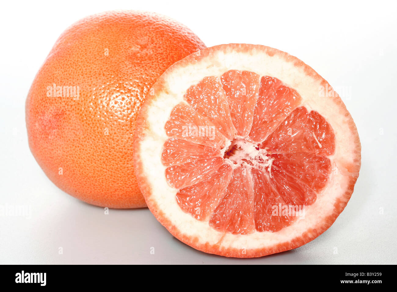 Pompelmo rosa a fette immagini e fotografie stock ad alta risoluzione ...