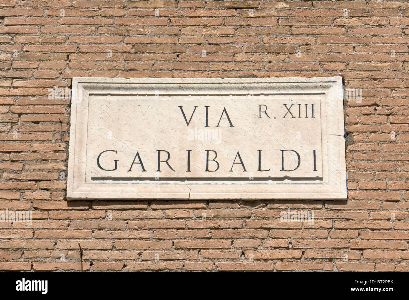 Il marmo strada segno via Garibaldi, Roma Foto stock - Alamy