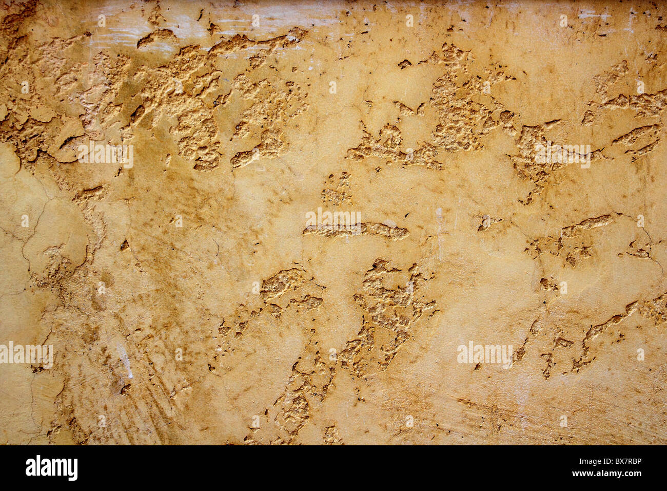 Giallo Ocra parete texture di sfondo grunge in casa mediterranea Foto ...