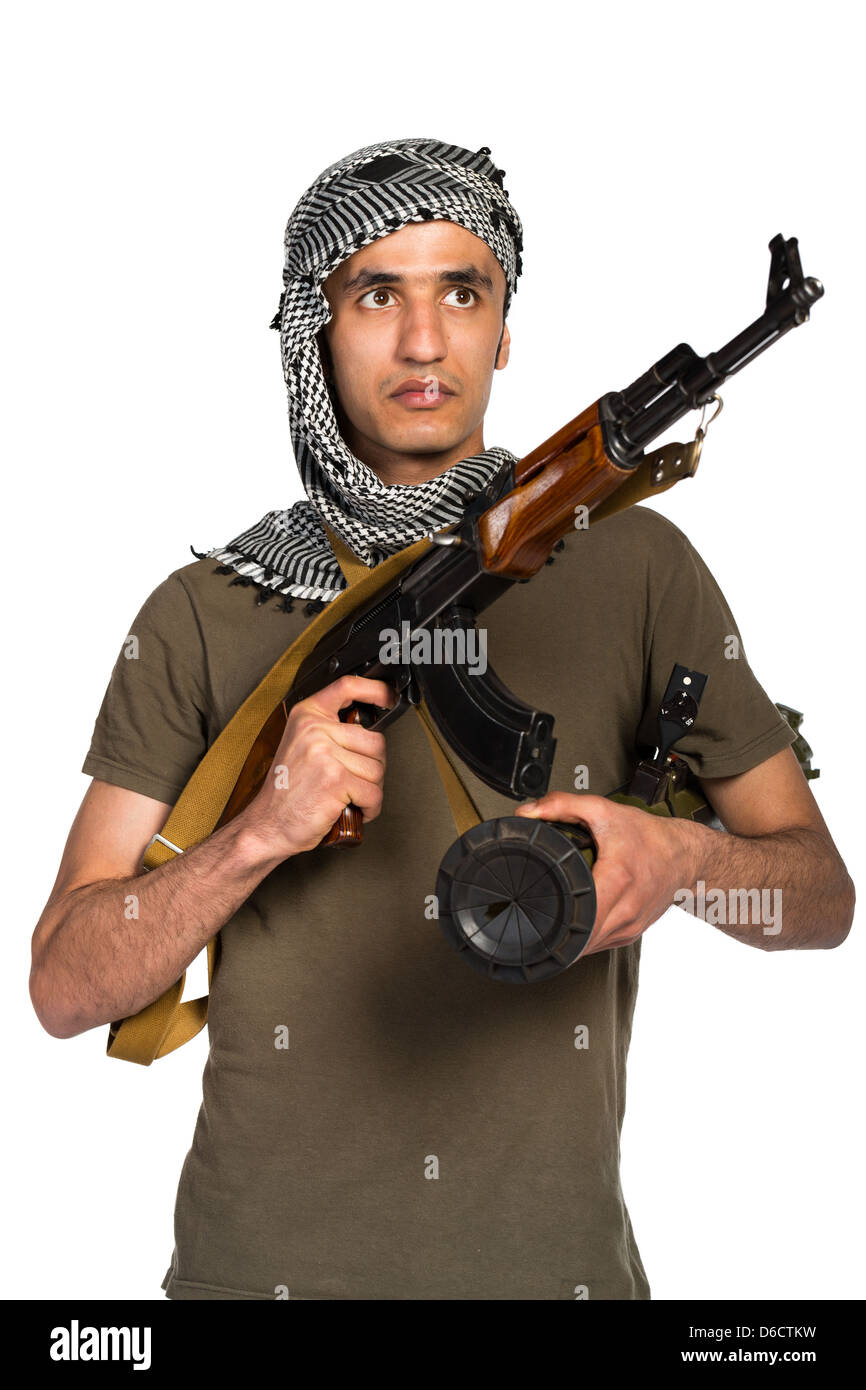 Terrorista nazionalità arabo in tuta mimetica e keffiyeh con pistola ...