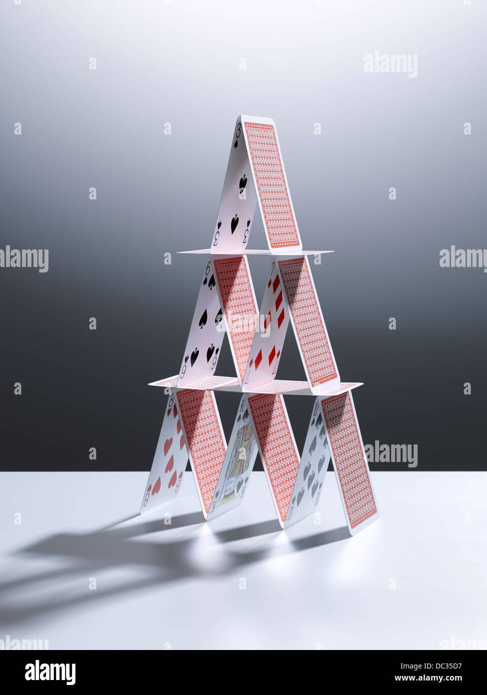 Pyramid of playing cards immagini e fotografie stock ad alta ...