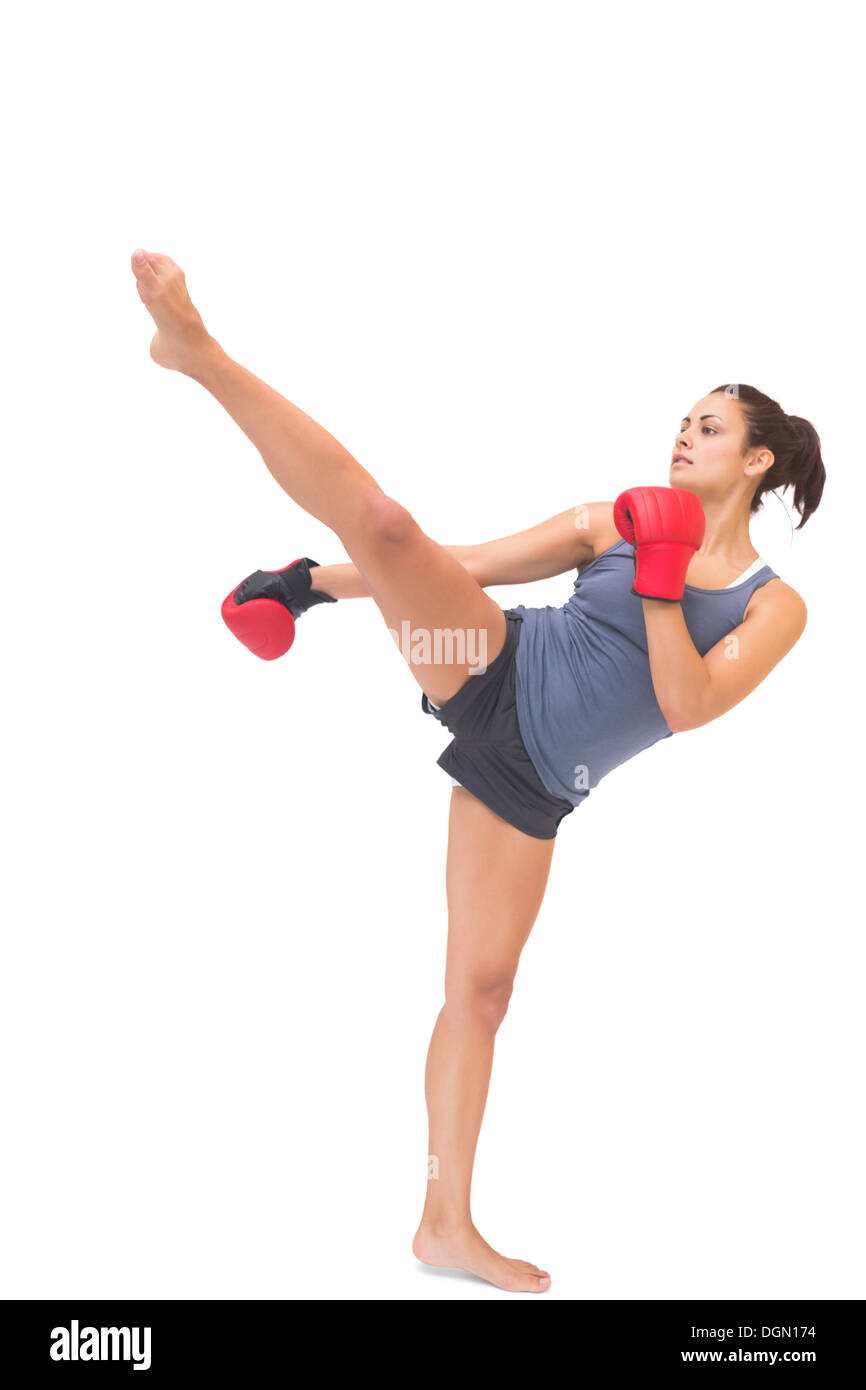Kick boxing young woman kicking immagini e fotografie stock ad alta ...