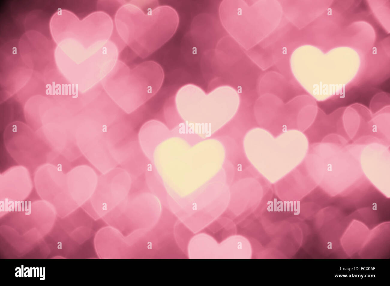 Cuore foto di sfondo colore rosa chiaro Foto stock - Alamy