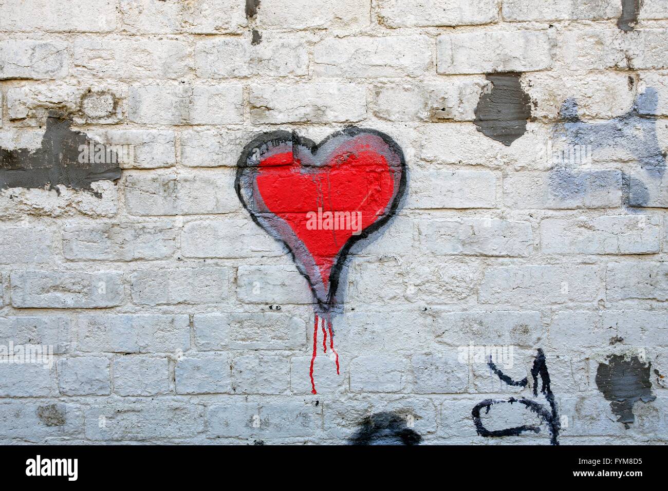 Graffiti su muro di mattoni immagini e fotografie stock ad alta ...