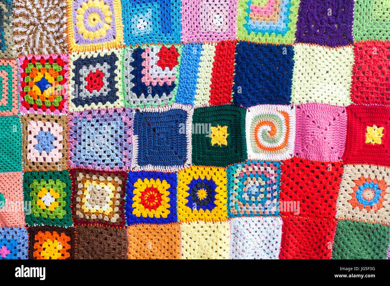 Colorati tappeti lavorati a maglia sfondo tessili Foto stock - Alamy