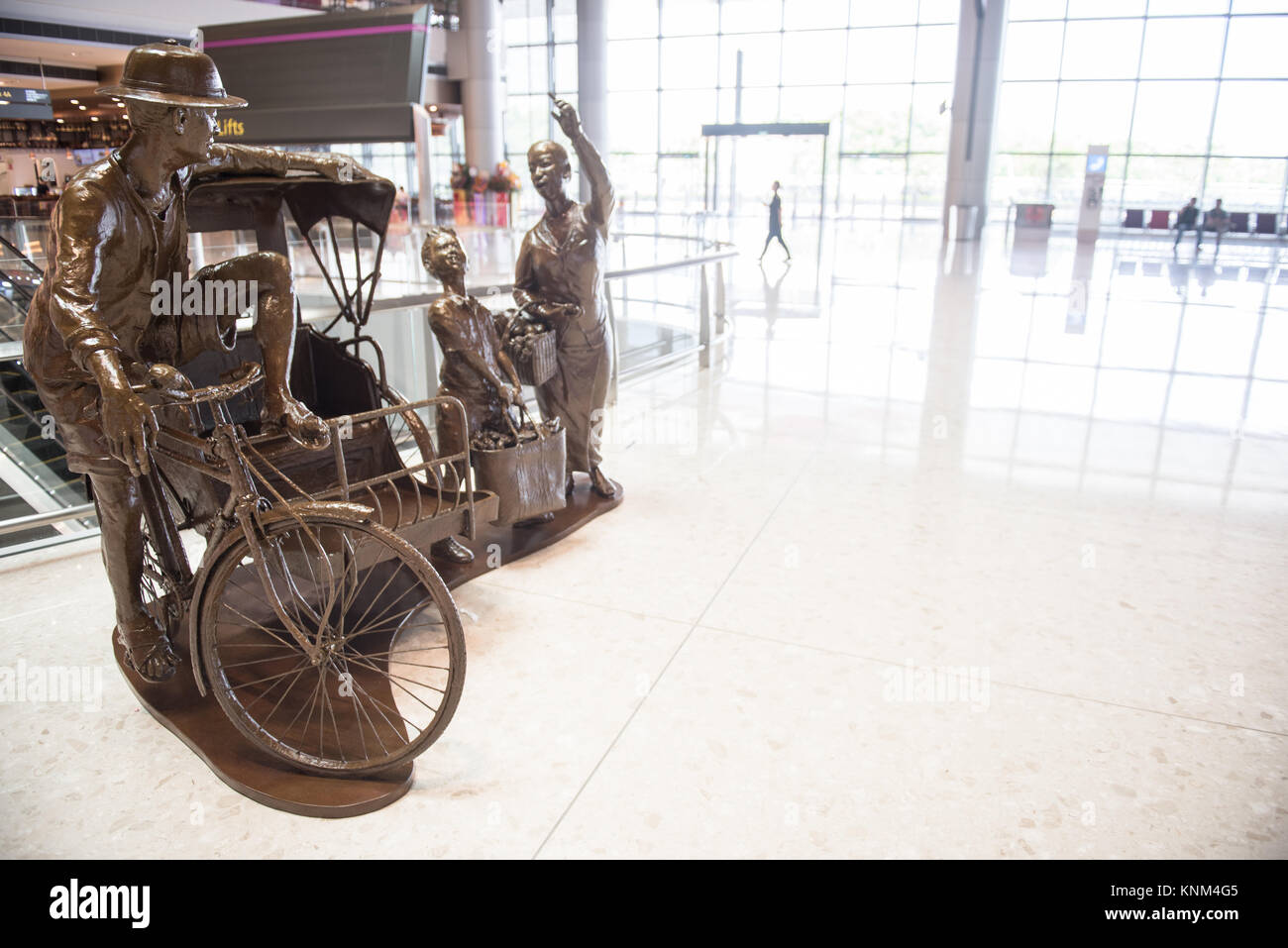 Hey, Ah Chek una scultura in bronzo creato da scultore di Singapore e ...