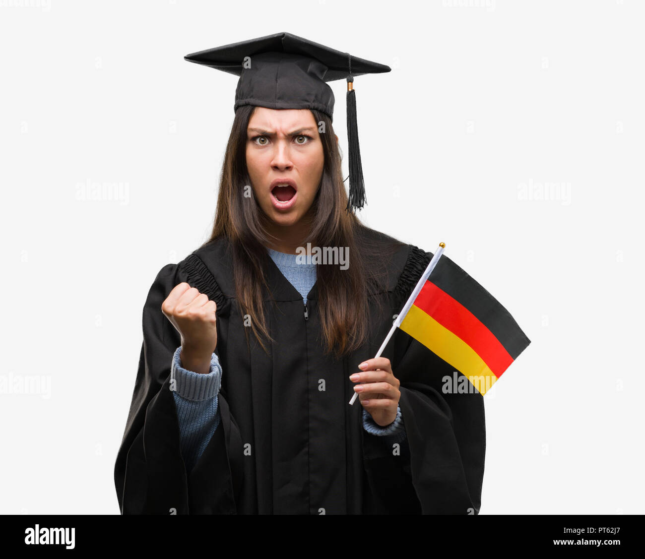 Giovane donna ispanica indossano uniformi graduata holding bandiera ...