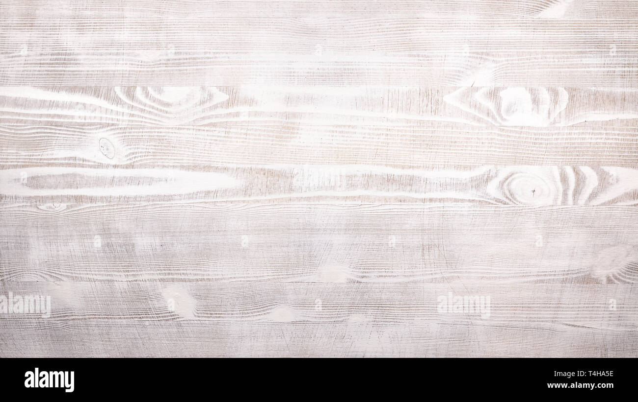 Bianco leggermente colorate in legno rustico sfondo della tabella con ...
